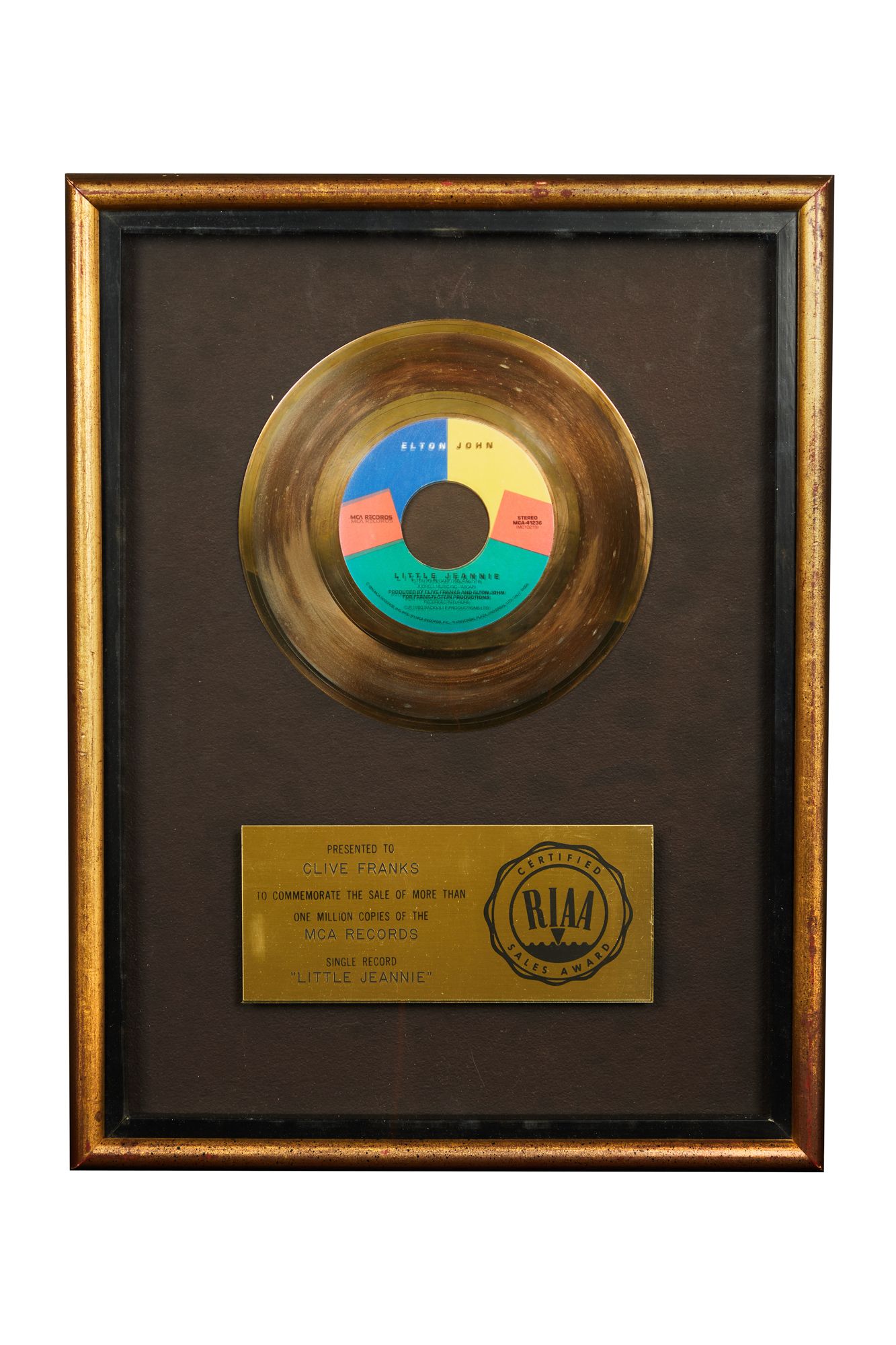 Elton John | RIAA Certified "Gold" Sales Award For "Little Jeanie" Presented to Clive Franks